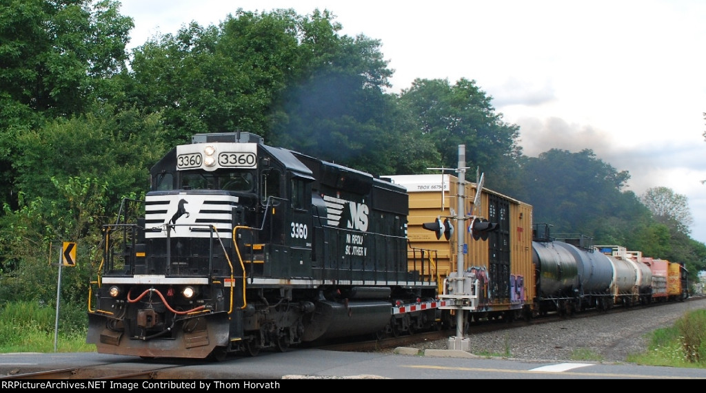 NS 3360 leads H76 through the LEHL Valley Road grade crossing